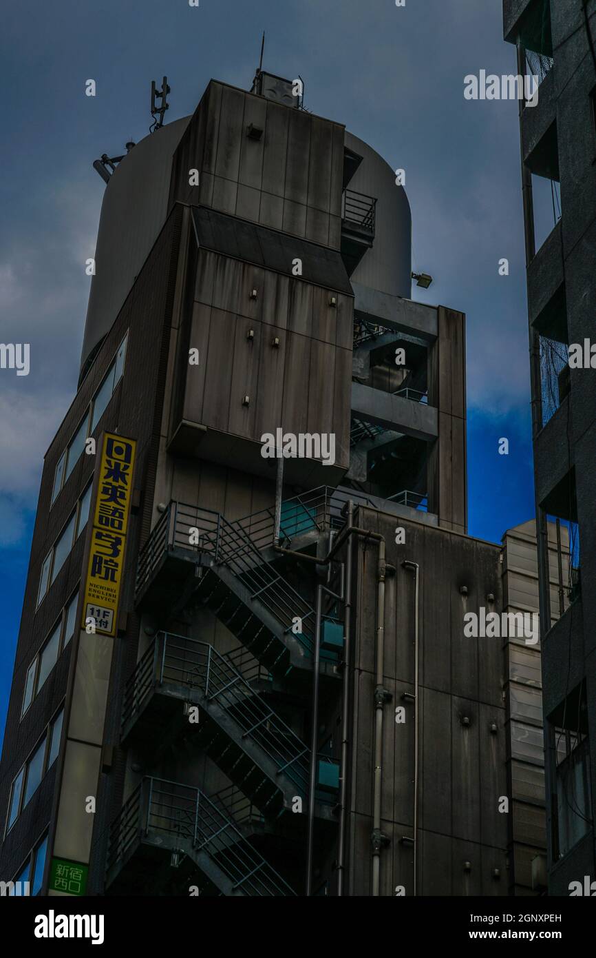 Multi-tenant building and blue sky. Shooting Location: Tokyo ...