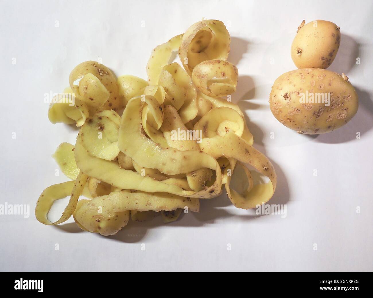 Pealing potatoes hi-res stock photography and images - Alamy