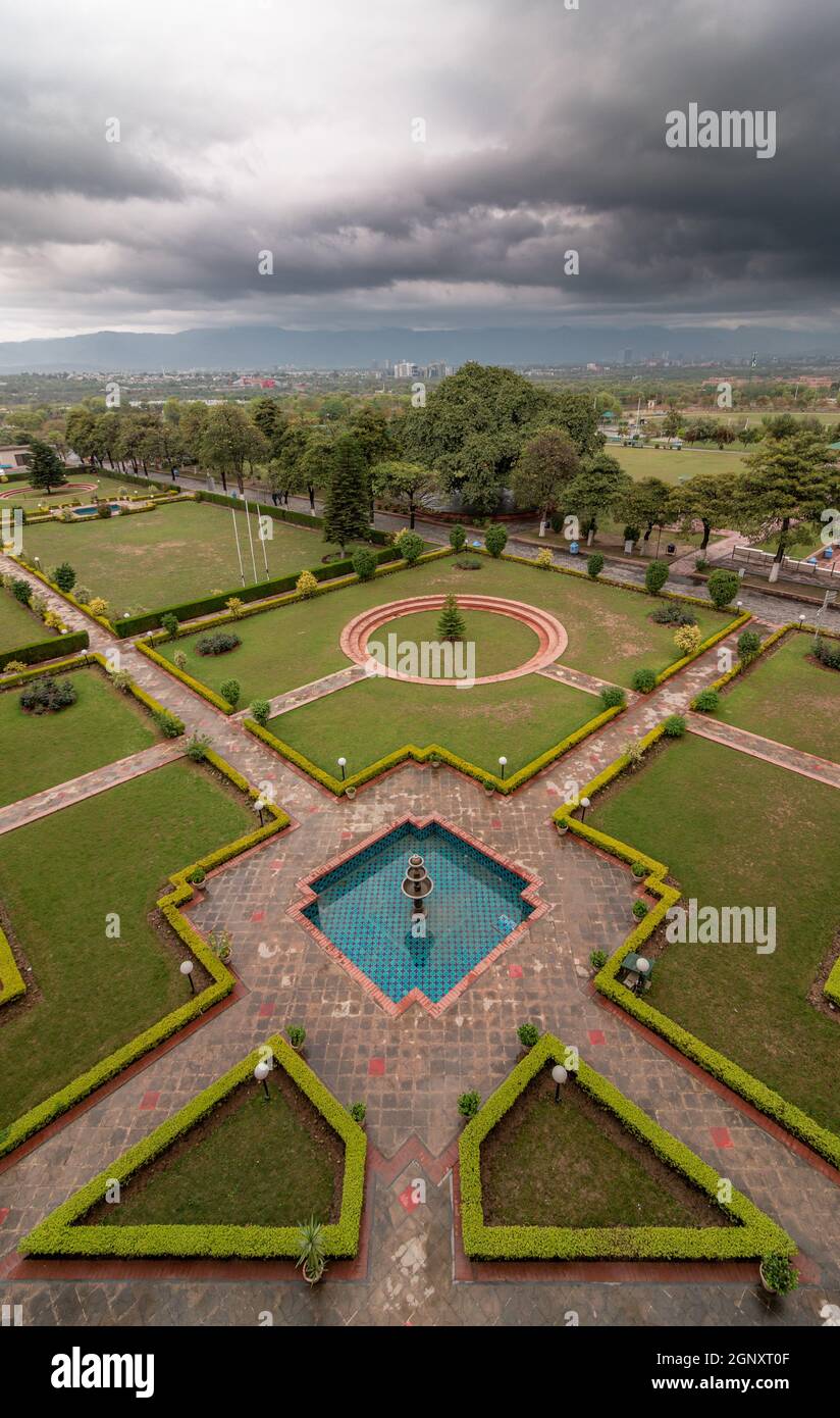 Aerial view of a beautiful park with fountains on the background of the ...