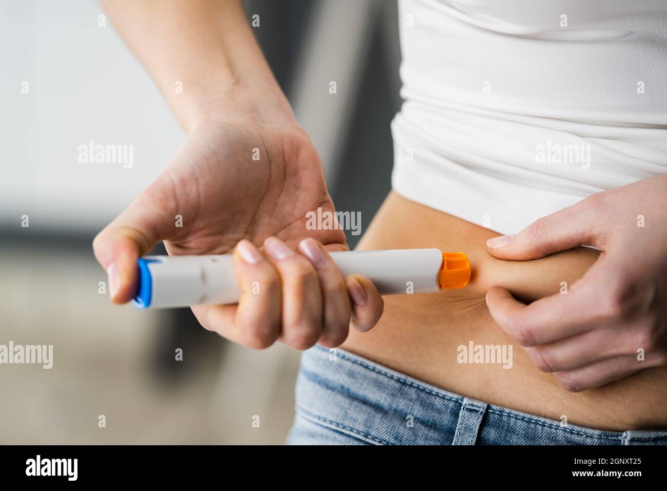 Medicament Self Injection In Belly Using Syringe With Drug Stock Photo ...