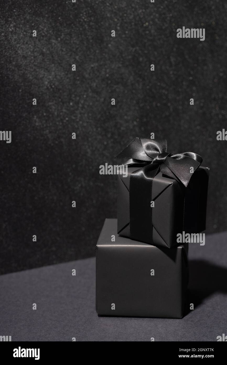 Black gift boxes hi-res stock photography and images - Alamy