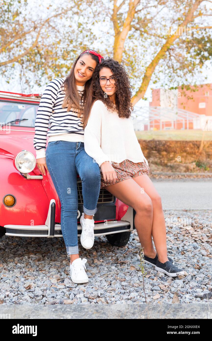 Two friends going on a roadtrip through countryside Stock Photo - Alamy
