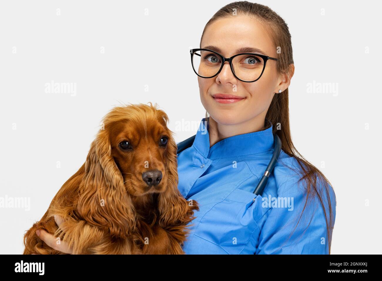 Portrait of young beautiful woman, female veterinary, vet doctor ...