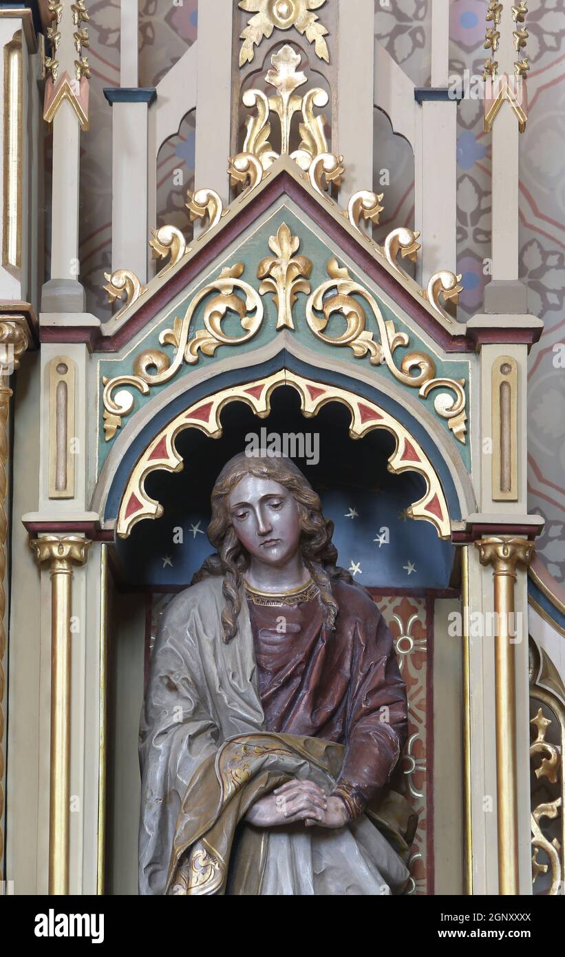 Saint Mary Magdalene statue on the Sacred heart of Jesus altar in the ...