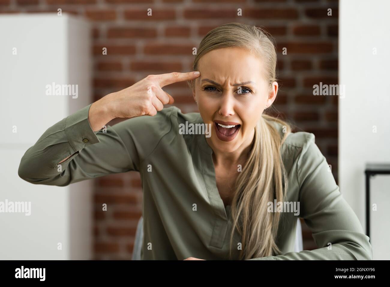 Workplace Quarrel. Angry Looking Woman In Video Conference Stock Photo ...