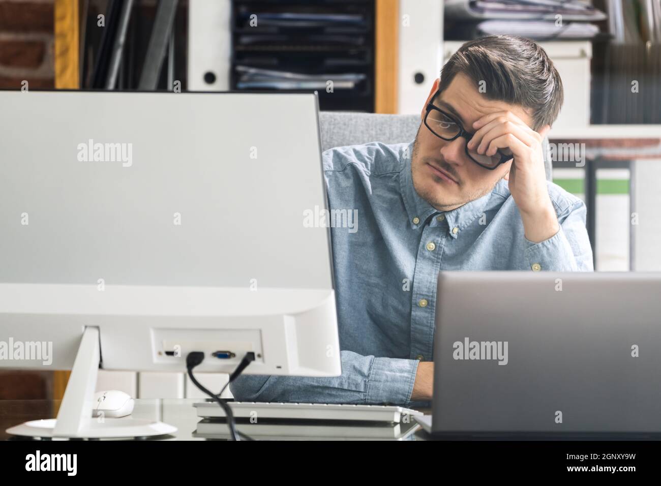 Bored Unhappy Man Watching In Online Virtual Lecture Webinar Stock ...