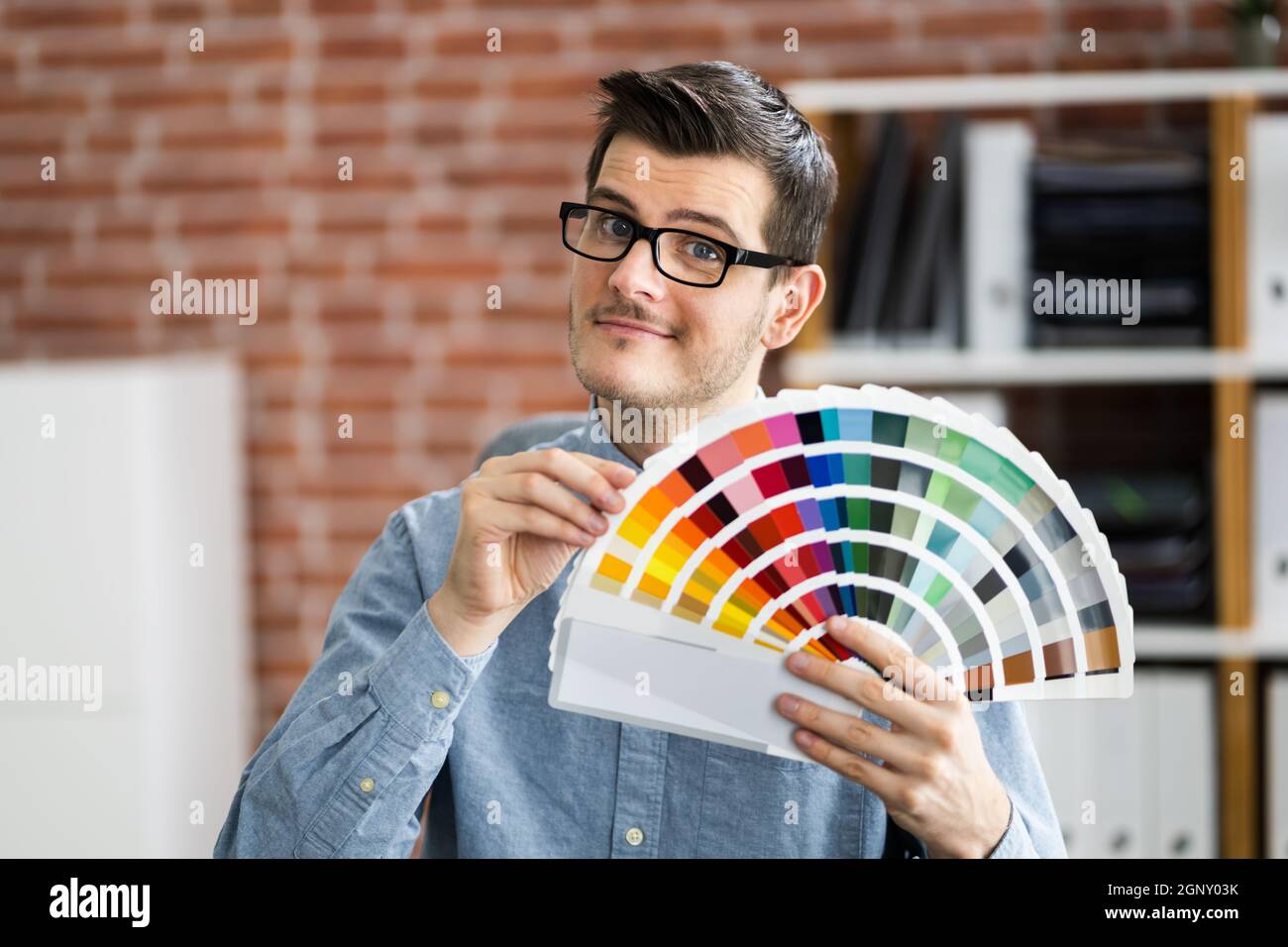 Designer Showing Samples In Video Conference Call Stock Photo - Alamy