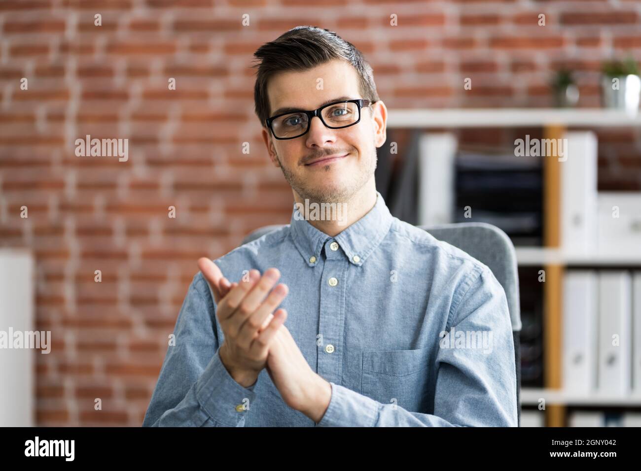 Man Clapping In Online Video Conference Business Call Stock Photo - Alamy