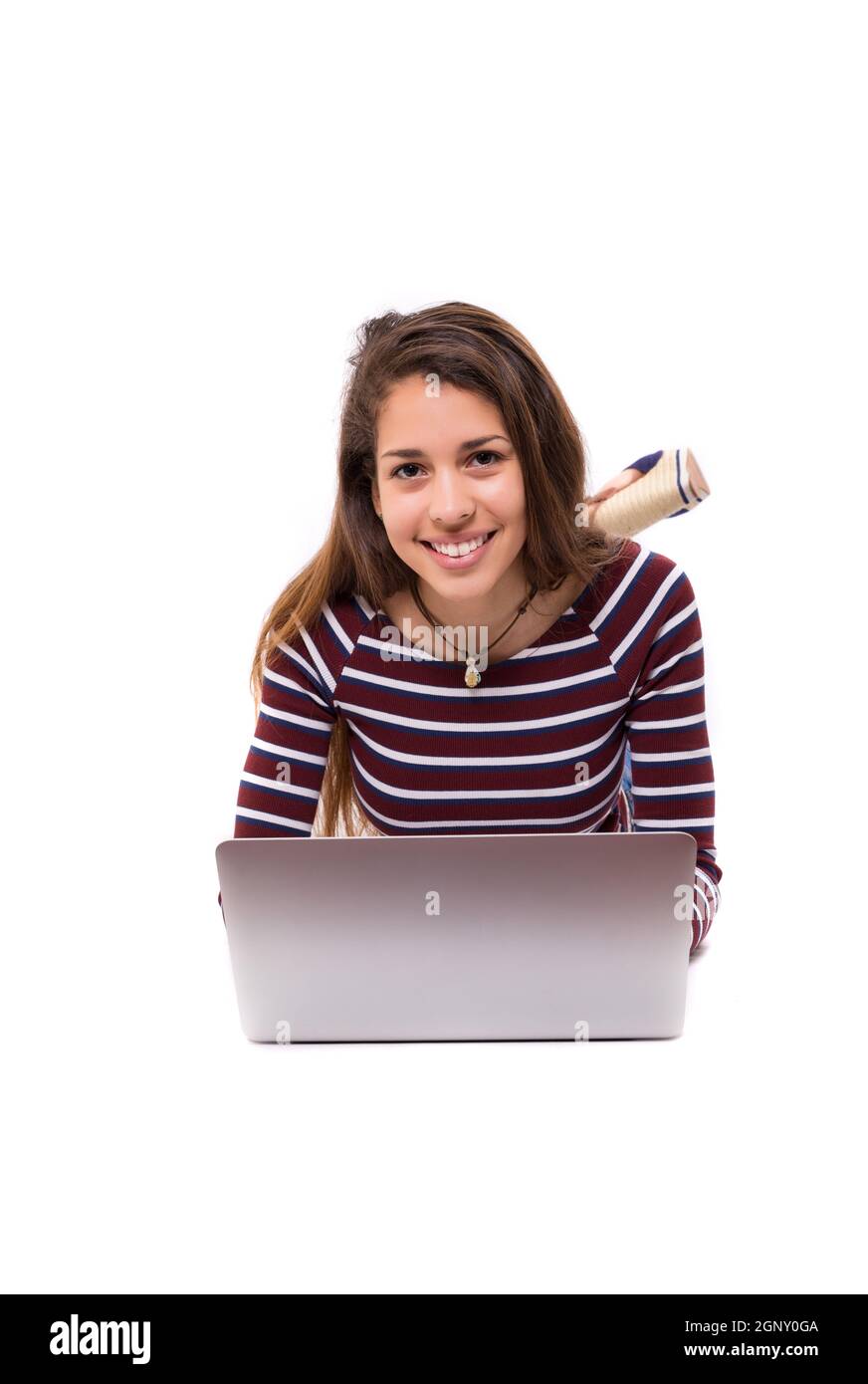 Young student working with her laptop, isolated over a white background ...
