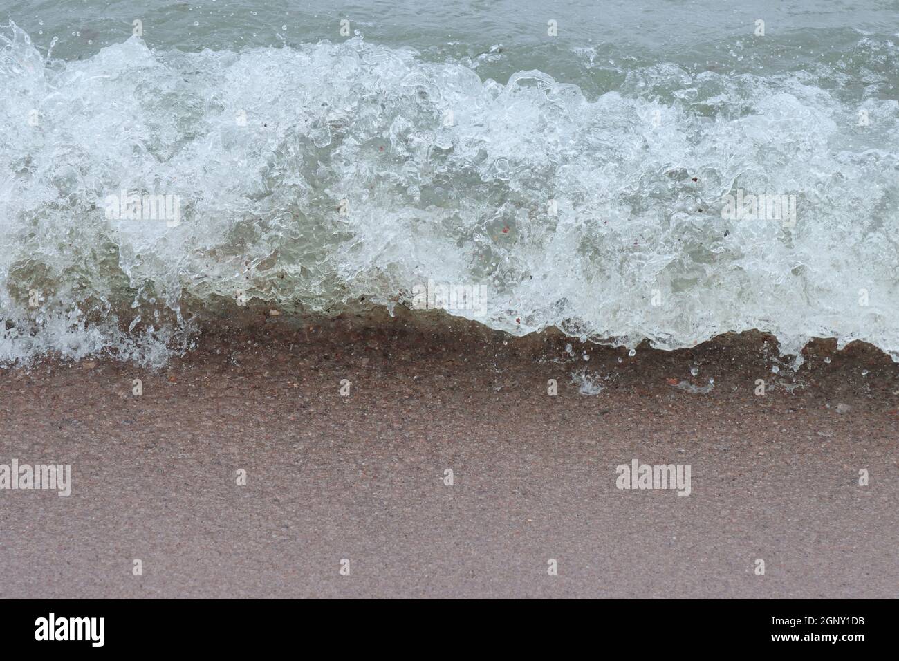 The wave of sea water rises to the shore. Landscape, beach Stock Photo ...
