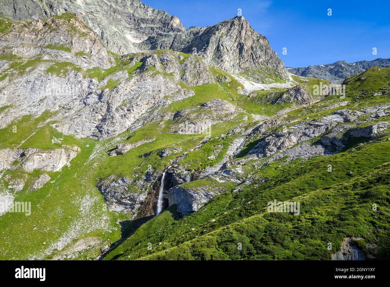 Waterfall in Vanoise national Park alpine valley, Savoie, French alps ...