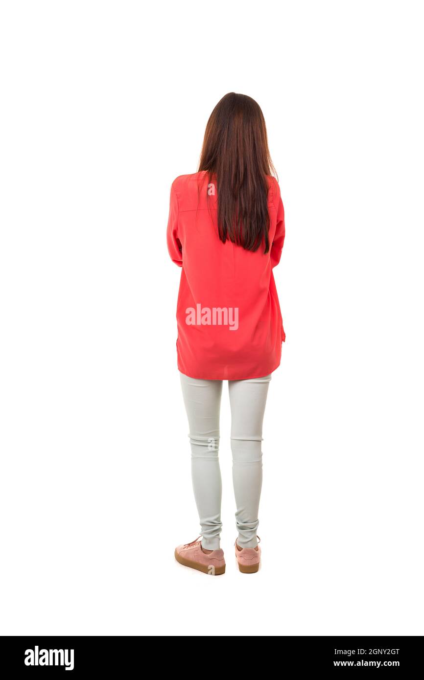 Woman posing with her back faced to camera, isolated over copy space ...