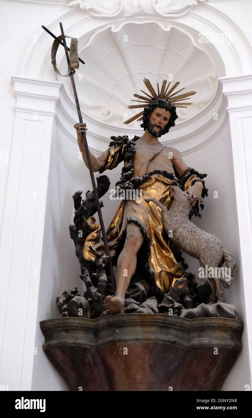 Saint John the Baptist, Altar in Collegiate church in Salzburg Stock ...