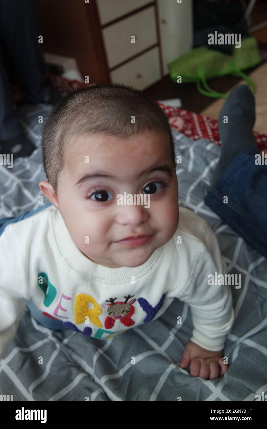 Baby girl with lovely face, big eyes and cute face gesture. Toddler ...