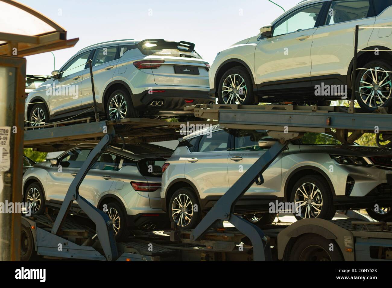 Transportation of new cars by truck. Lots of new machines on the ...