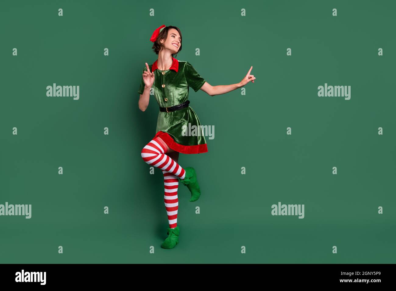 Full length body size view of attractive cheerful girl elf dancing ...