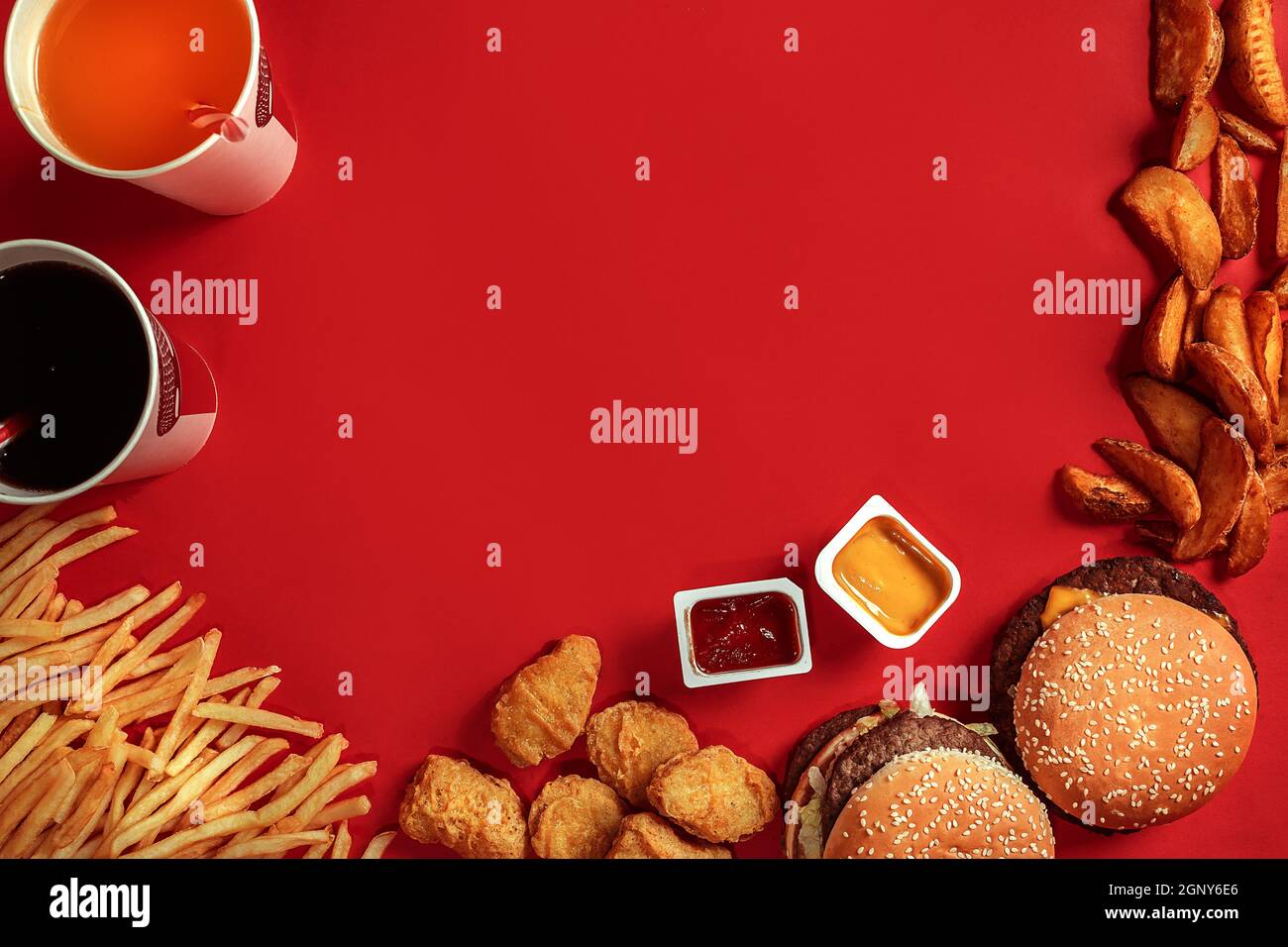 Fast food dish top view. Meat burger, potato chips and glass of drink ...