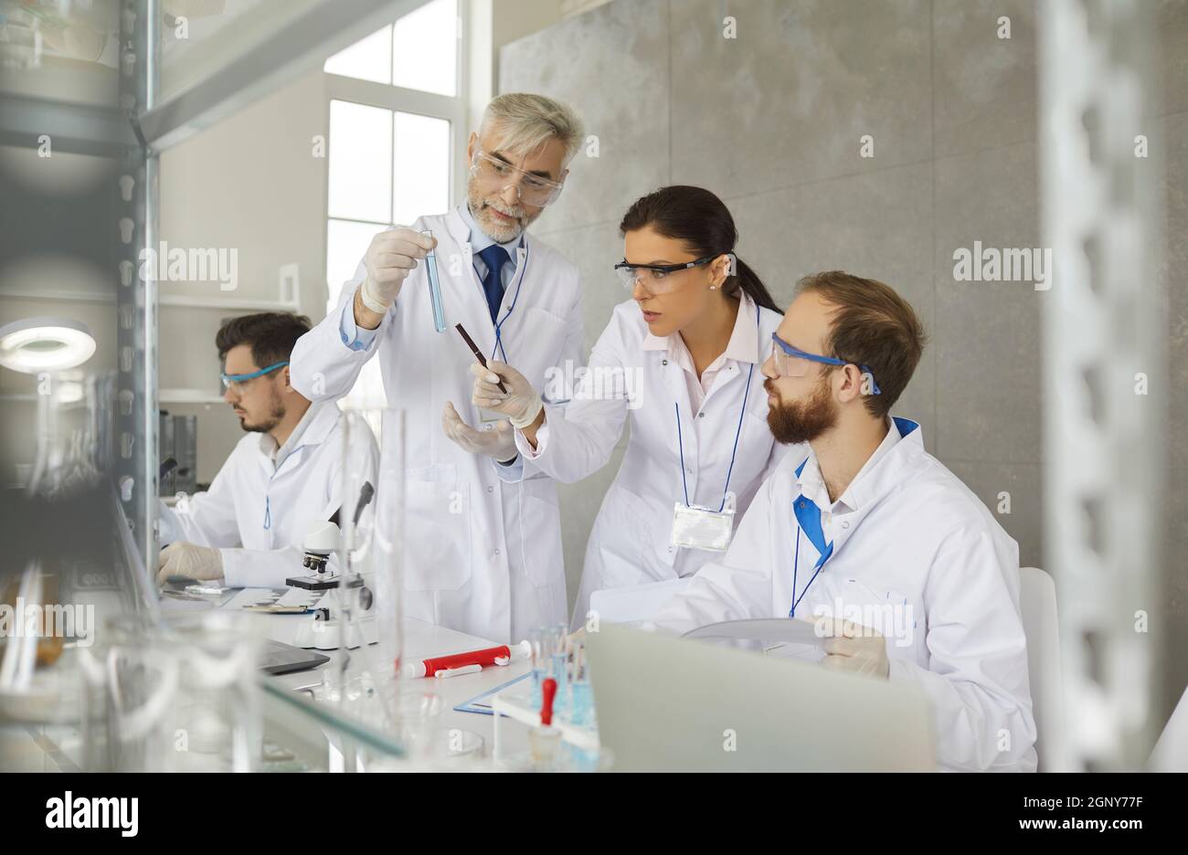 Men and women are professional medical scientists working in the ...