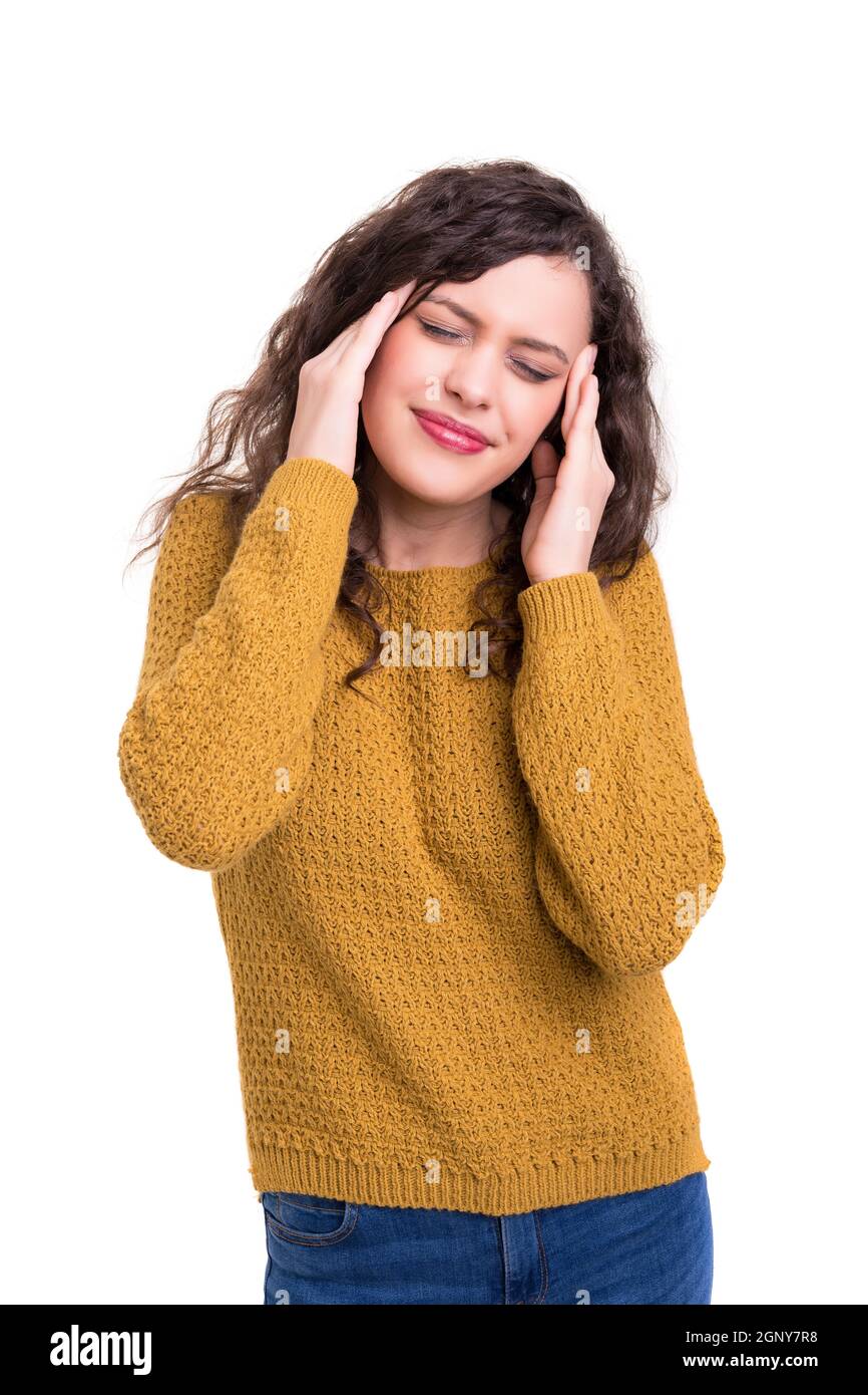 Young woman with a strong headache, isolated over white background ...