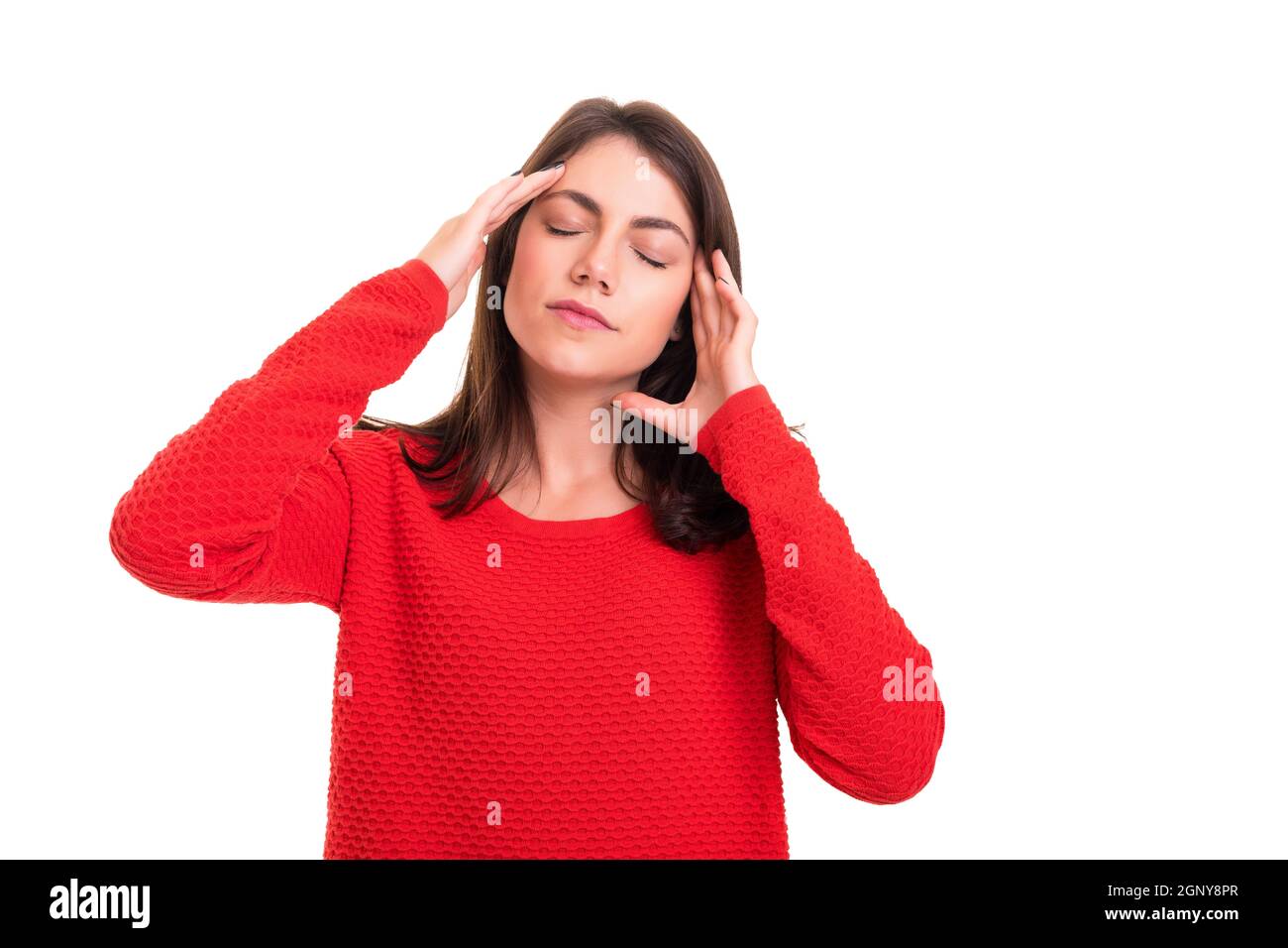 Young woman with a strong headache, isolated over white background ...