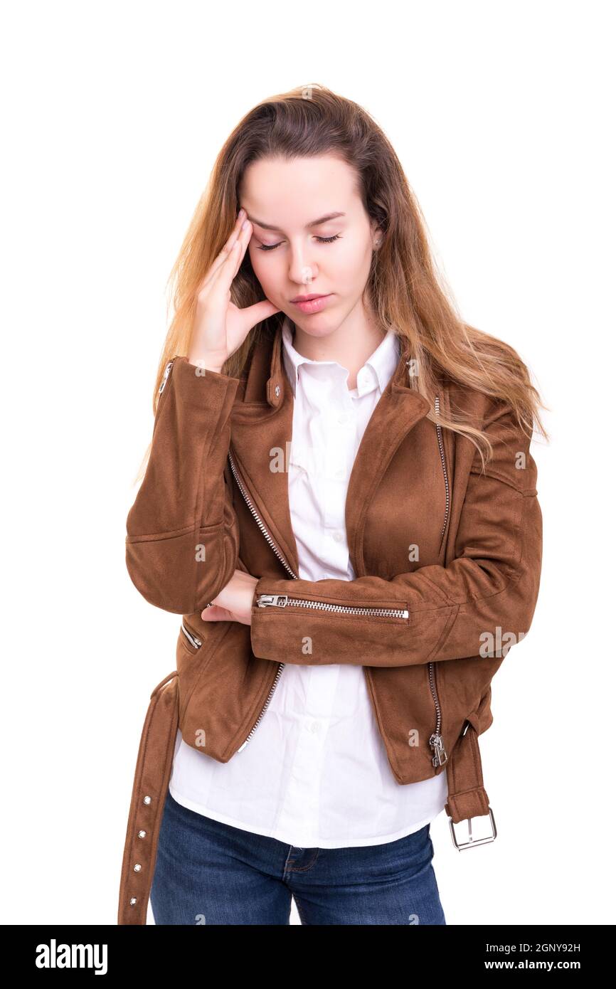 Young woman with a strong headache, isolated over white background ...