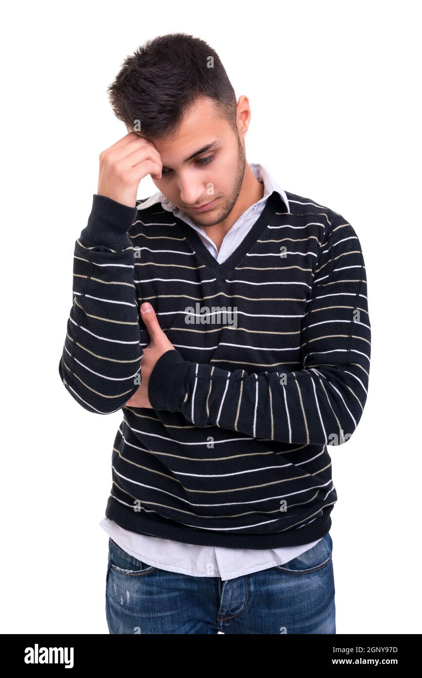 Troubled young man posing isolated over white background Stock Photo ...
