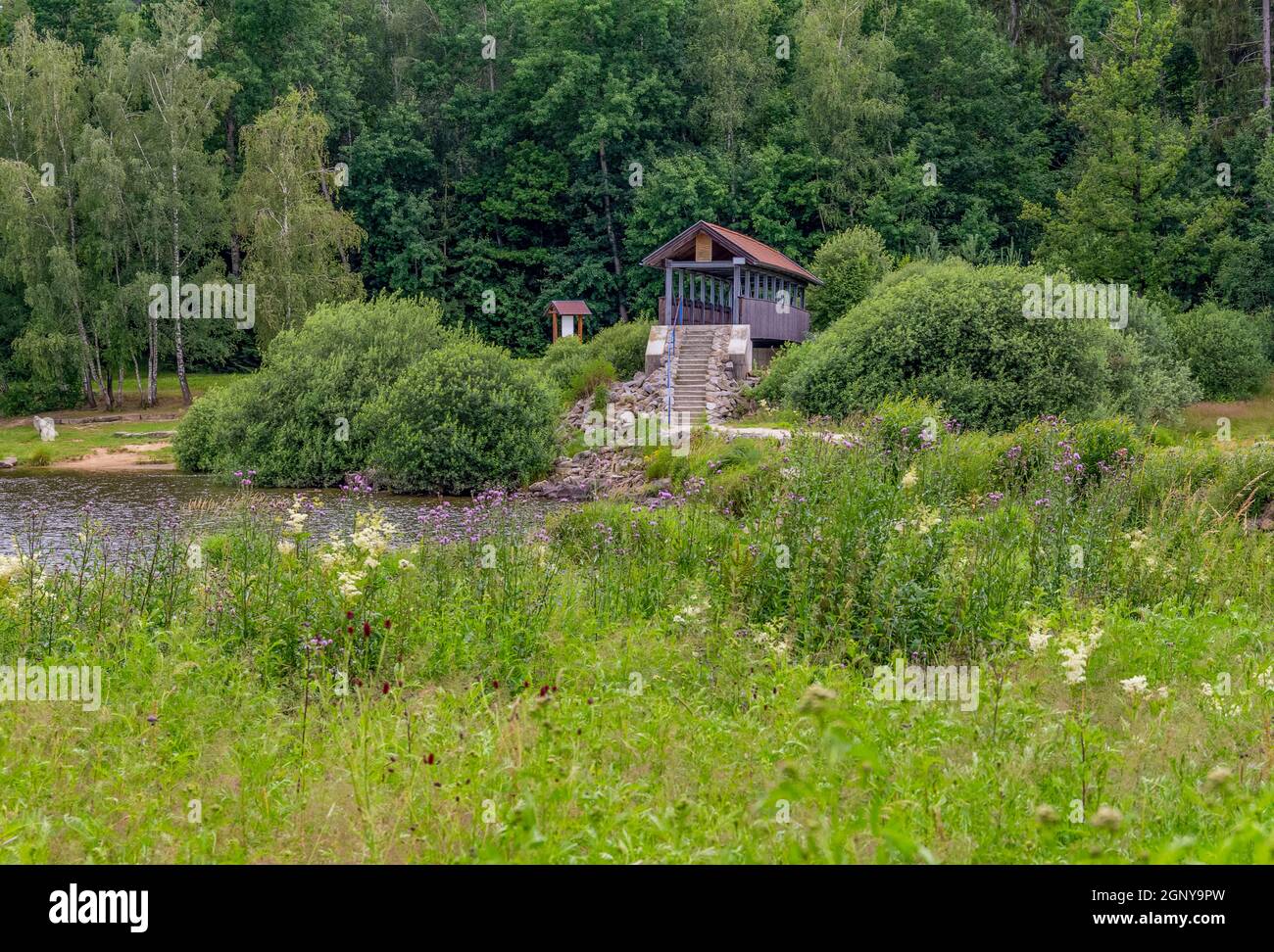 idyllic waterside scenery including a roofed bridge around Wiesenfelden ...