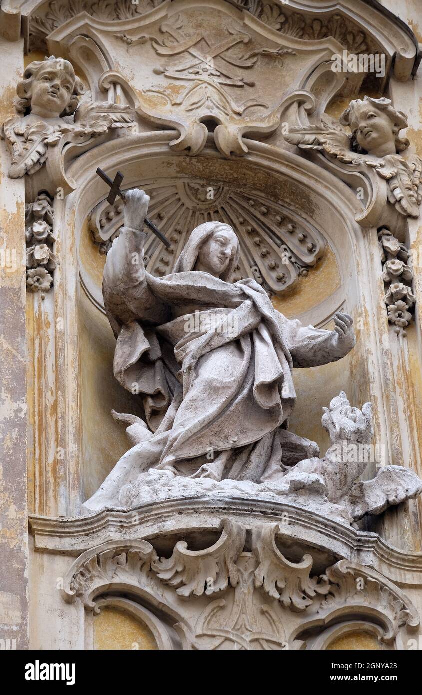 Statue of Saint Martha of Bethany on facade of Santa Maria Maddalena ...