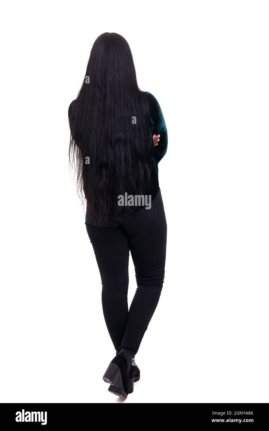 Woman posing with her back faced to camera, isolated over copy space ...