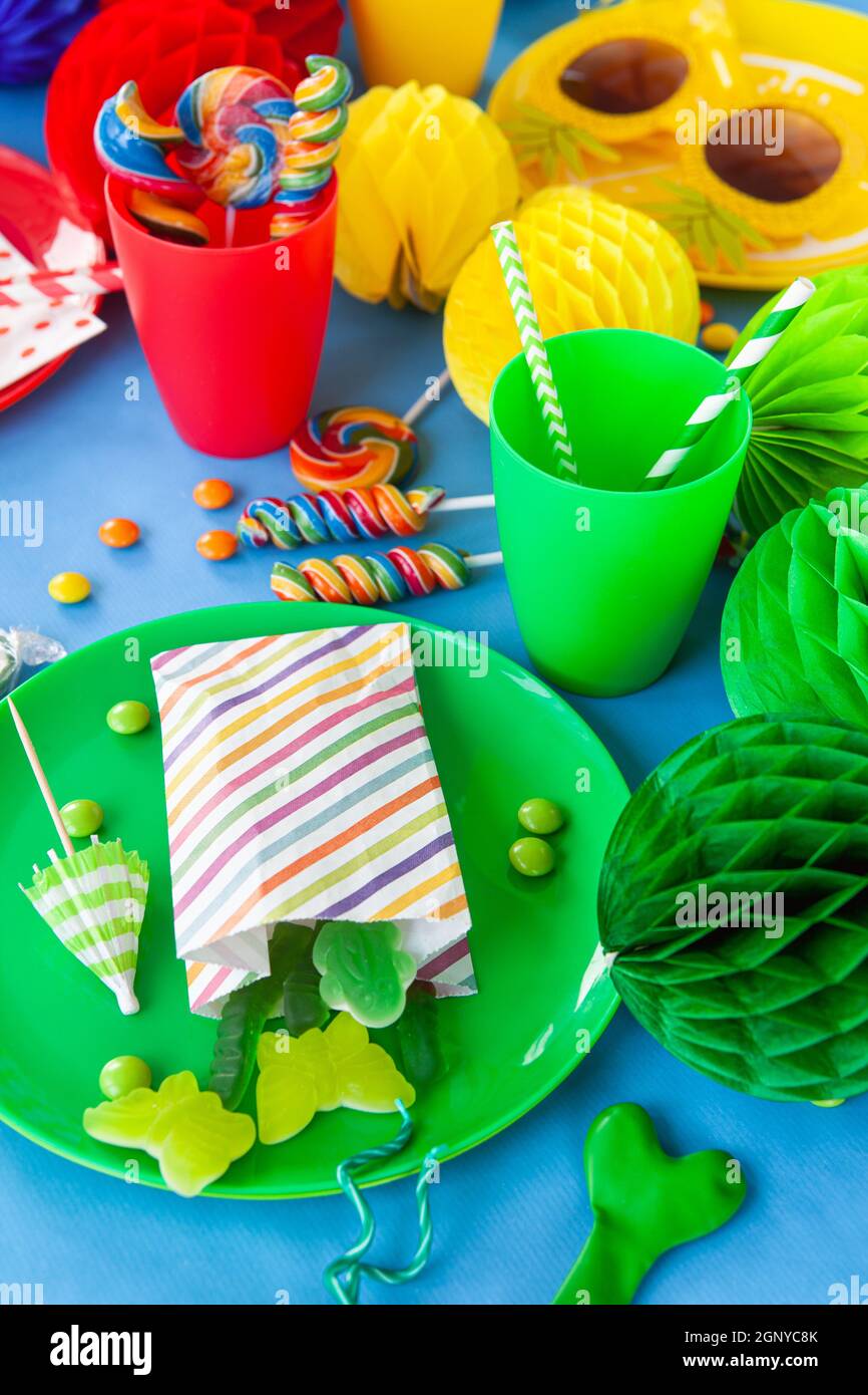 Colorful table setting with decorations for a party / kids birthday ...
