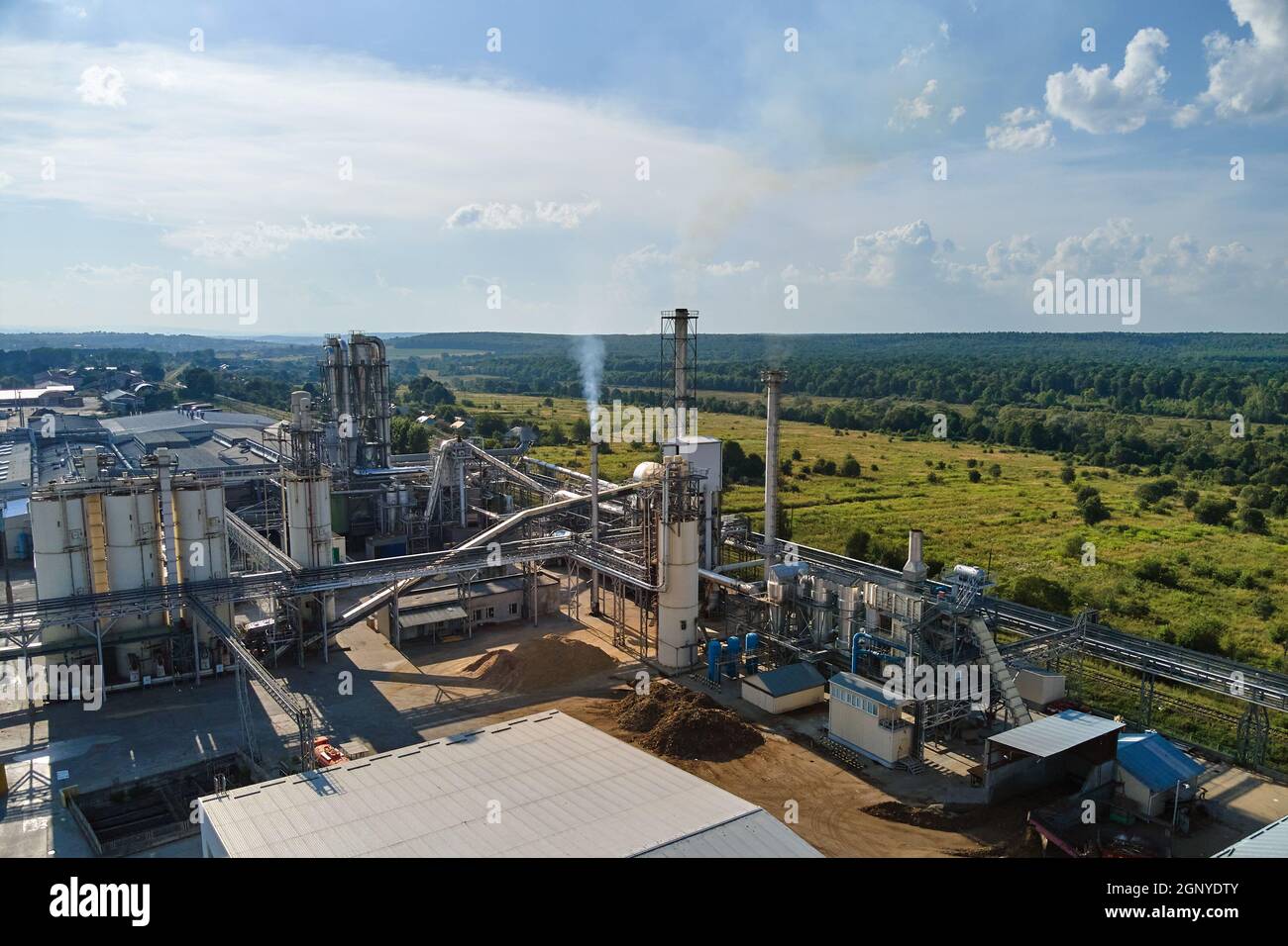 Aerial view of oil and gas refining petrochemical factory with tall ...