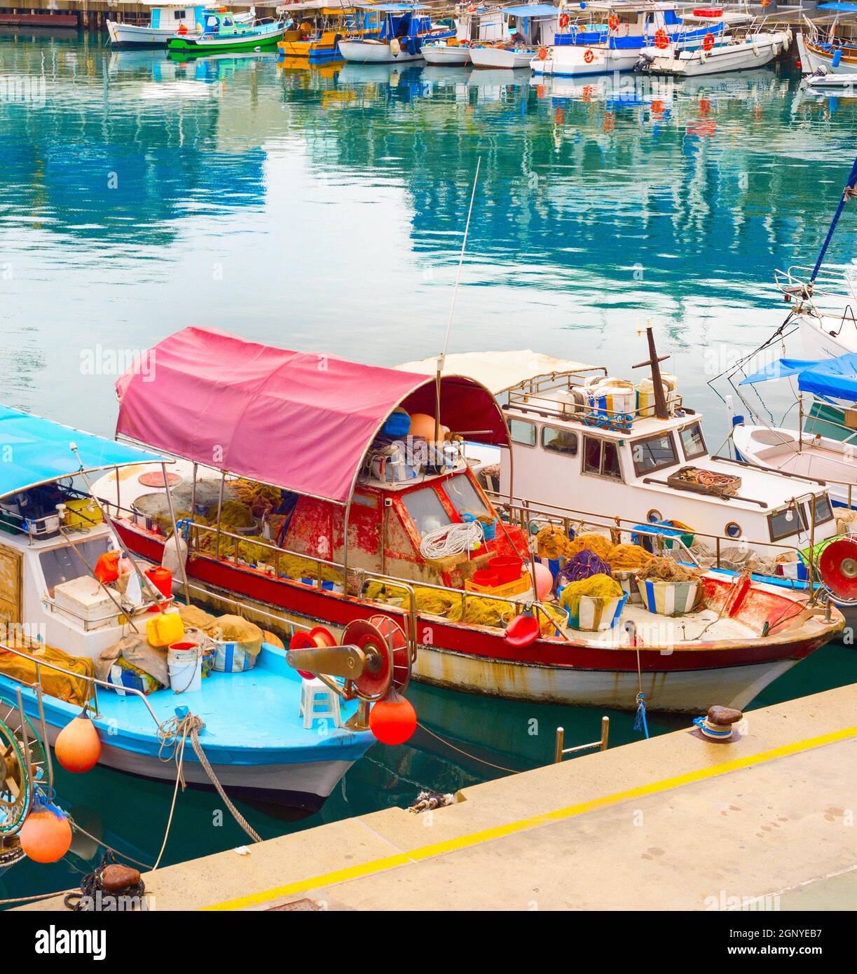 Typical Cyprus fishing boats in Limassol harbor Stock Photo - Alamy