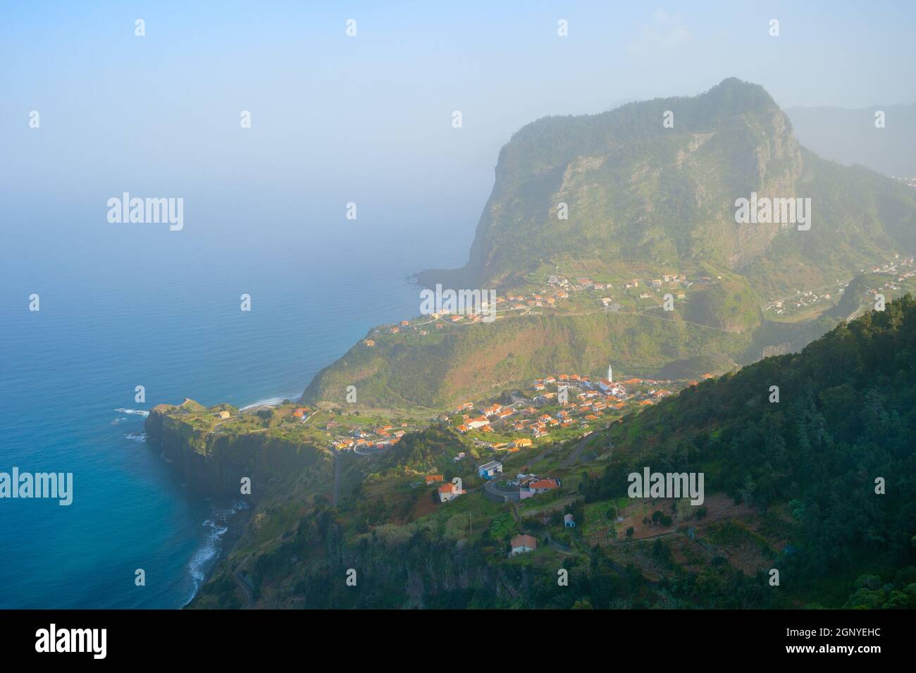 Landscape with Maderia village, mountains and ocean. Madeira island ...