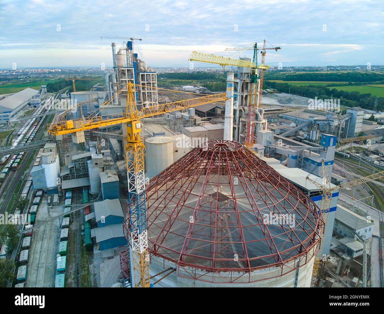 Aerial view of cement factory under construction with high concrete ...