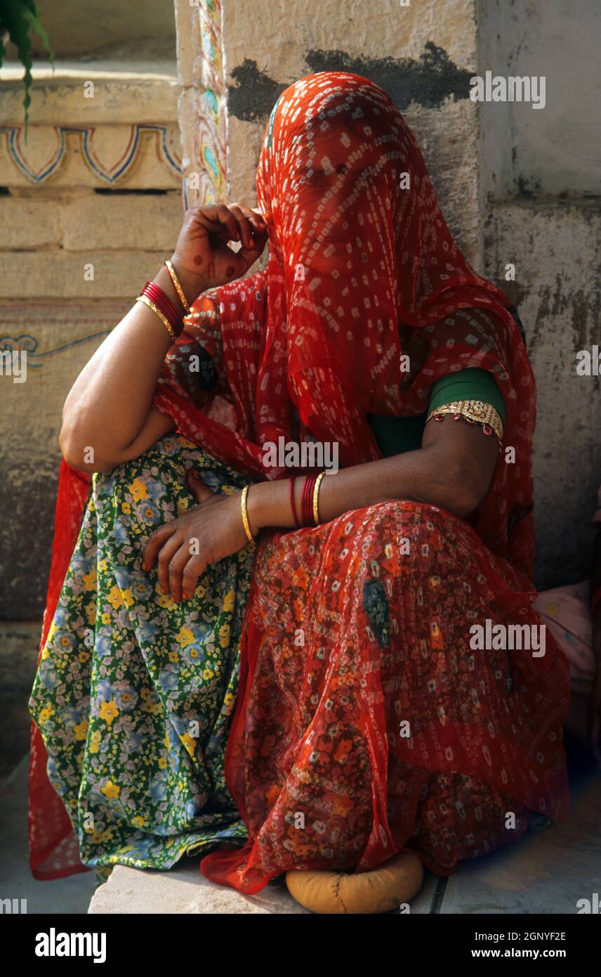 Traditional Indian woman in red scarf Rajasthan, India Stock Photo - Alamy