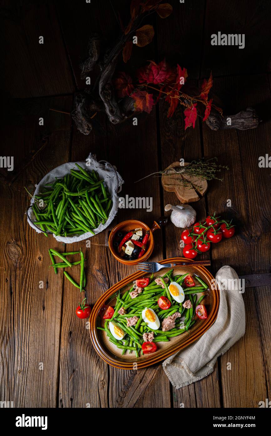Rustic green bean salad with egg and tuna Stock Photo - Alamy
