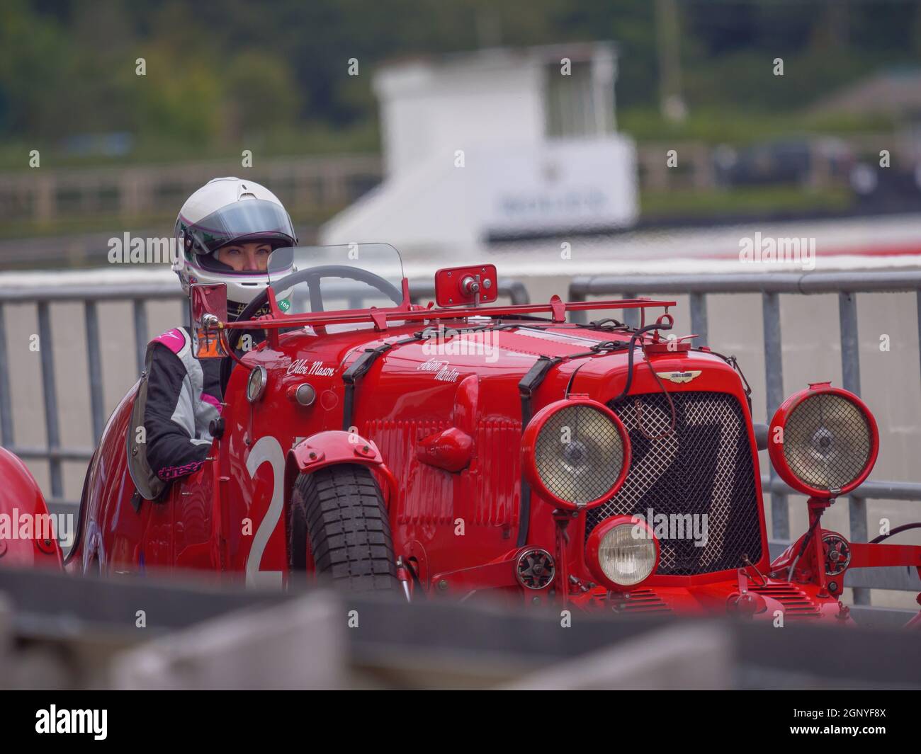 Holly Mason driving an Aston Martin Ulster at Goodwood motor racing ...