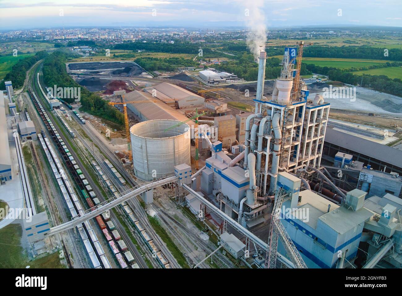 Aerial view of cement factory with high concrete plant structure and ...