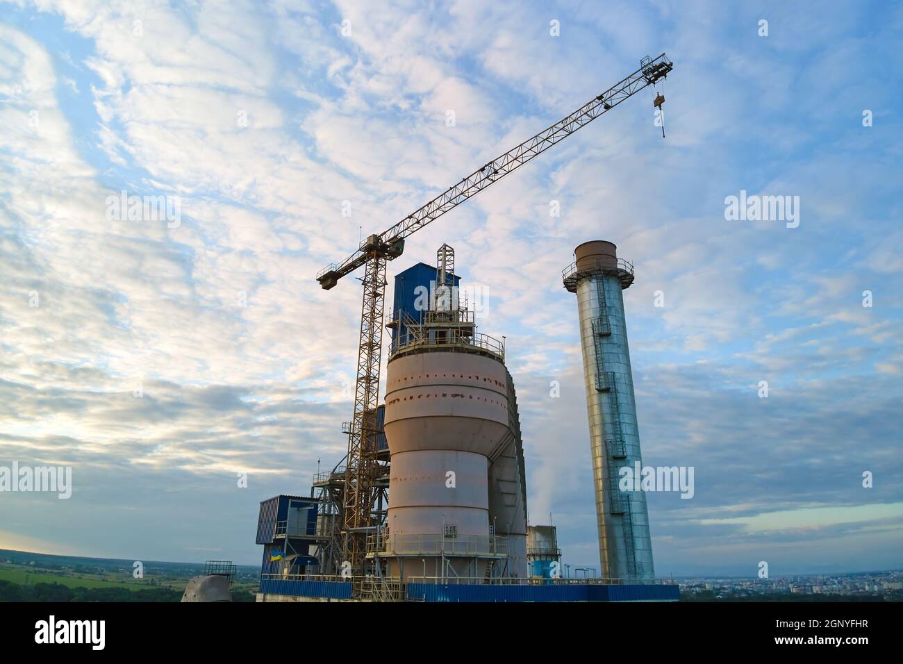Aerial view of cement factory under construction with high concrete ...