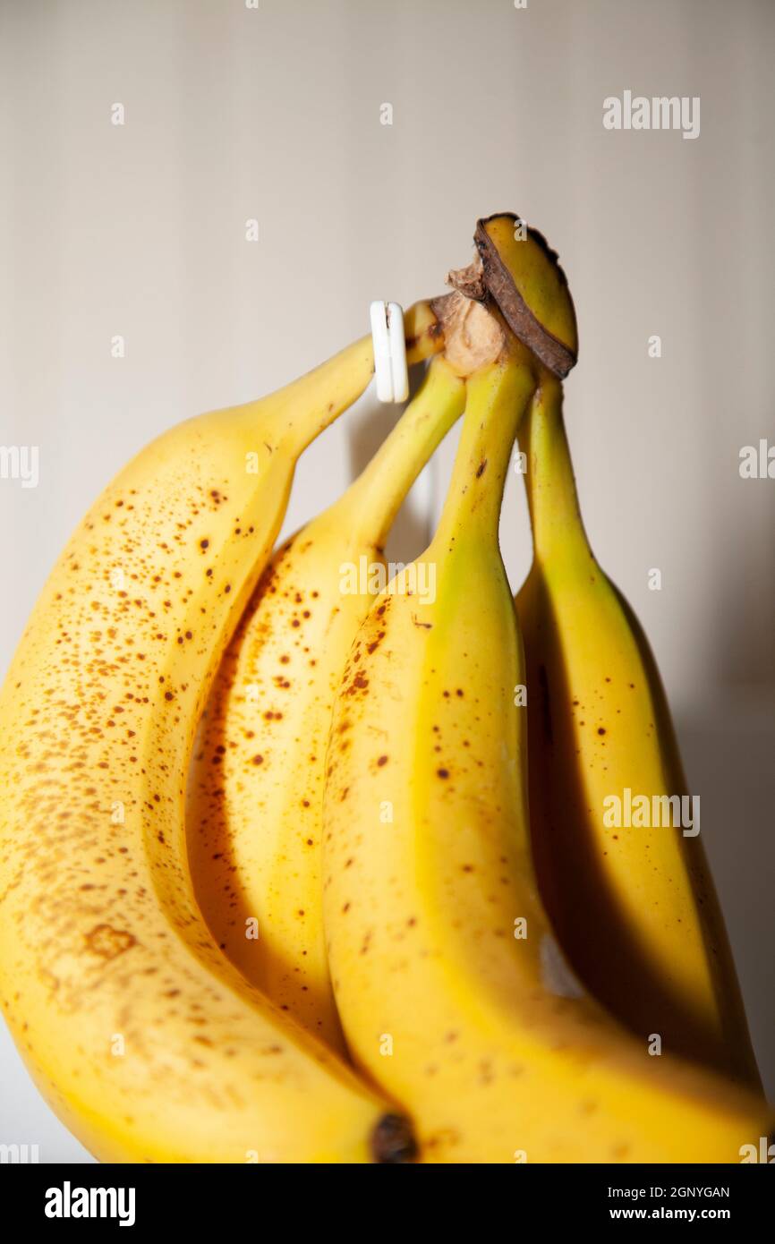 Bananas hanging kitchen hi-res stock photography and images - Alamy