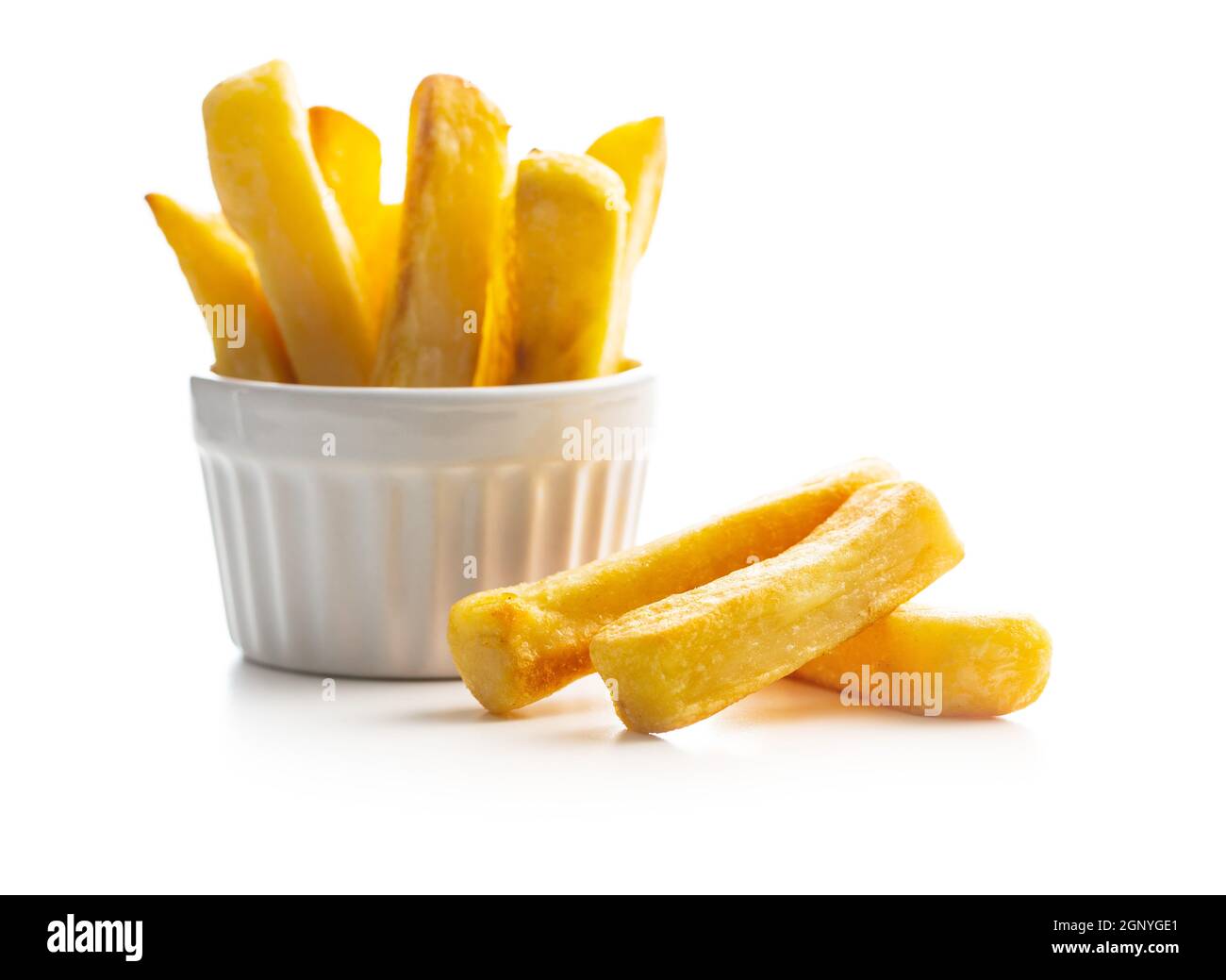 Big french fries. Fried potato chips isolated on white background Stock ...