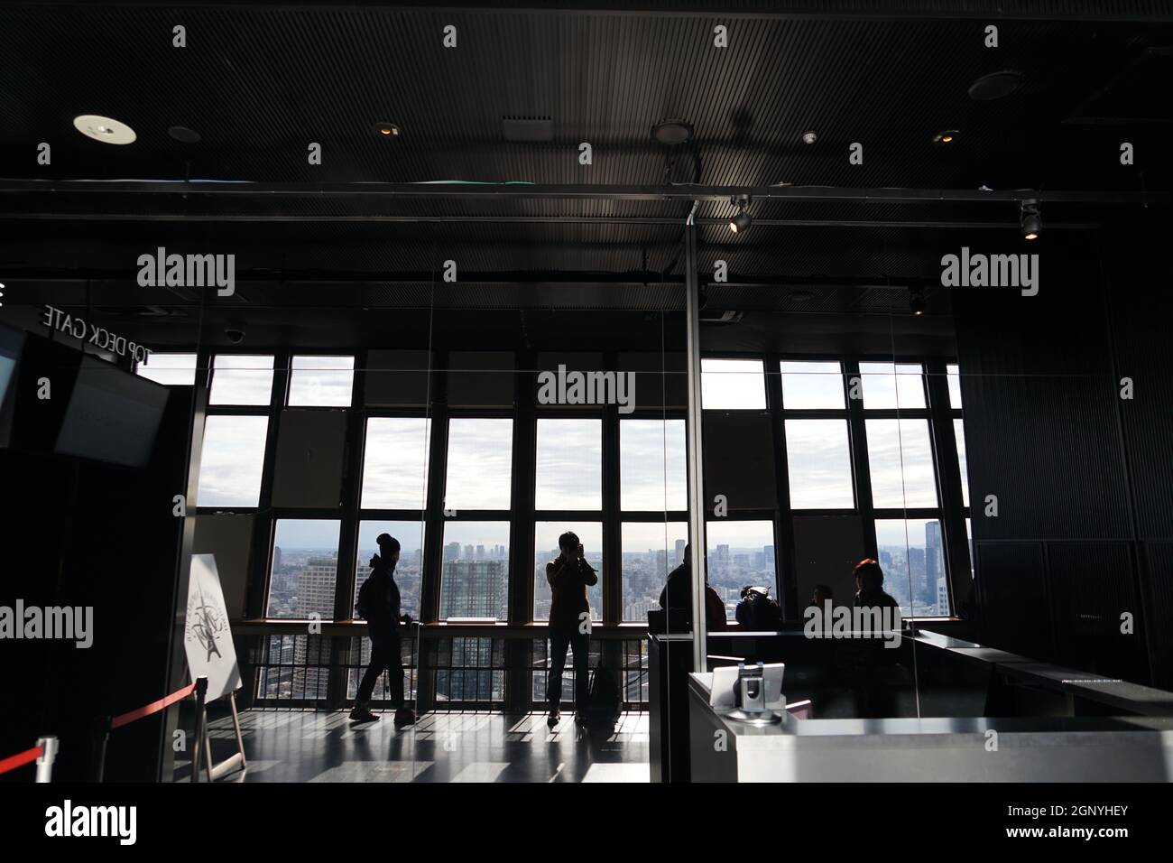 Tokyo skyline visible to the Tokyo Tower Observatory through a window ...