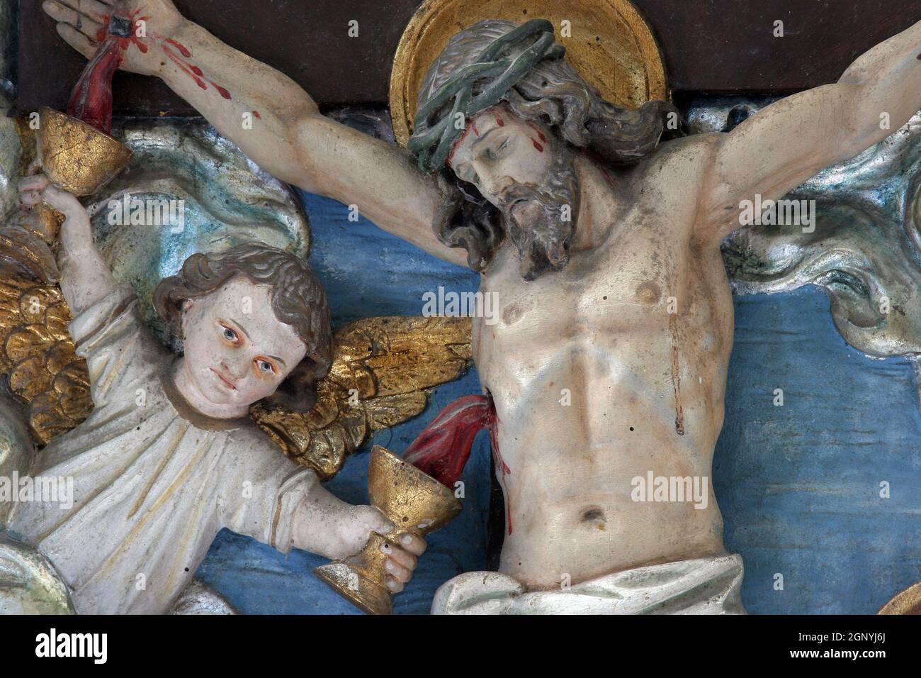 Angel collecting blood from the wounds of Christ, altar adoration of ...