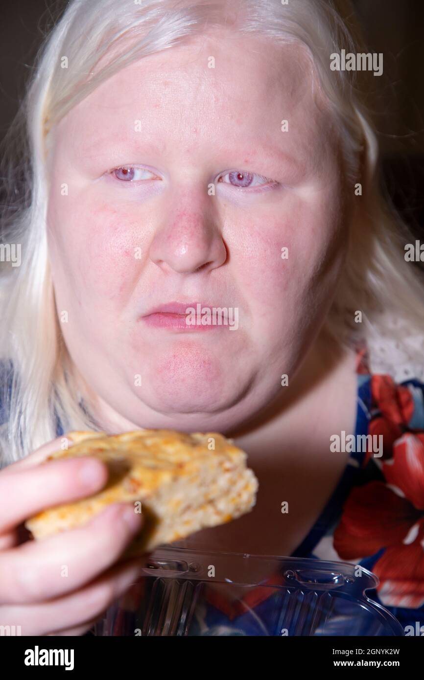 Woman thinking serious or sad thoughts while eating breakfast Stock ...