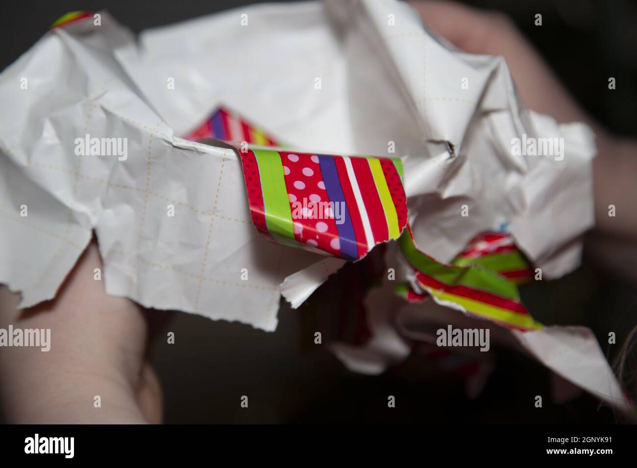 Brightly colored wrapped gift hi-res stock photography and images - Alamy