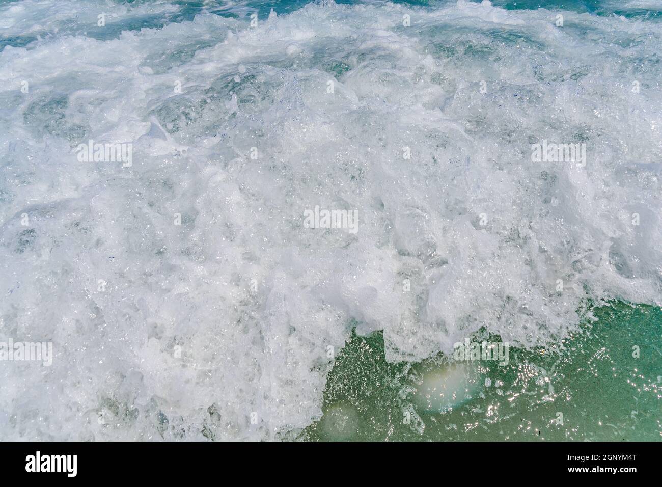Sea shore tropical wave foam nature background Stock Photo - Alamy