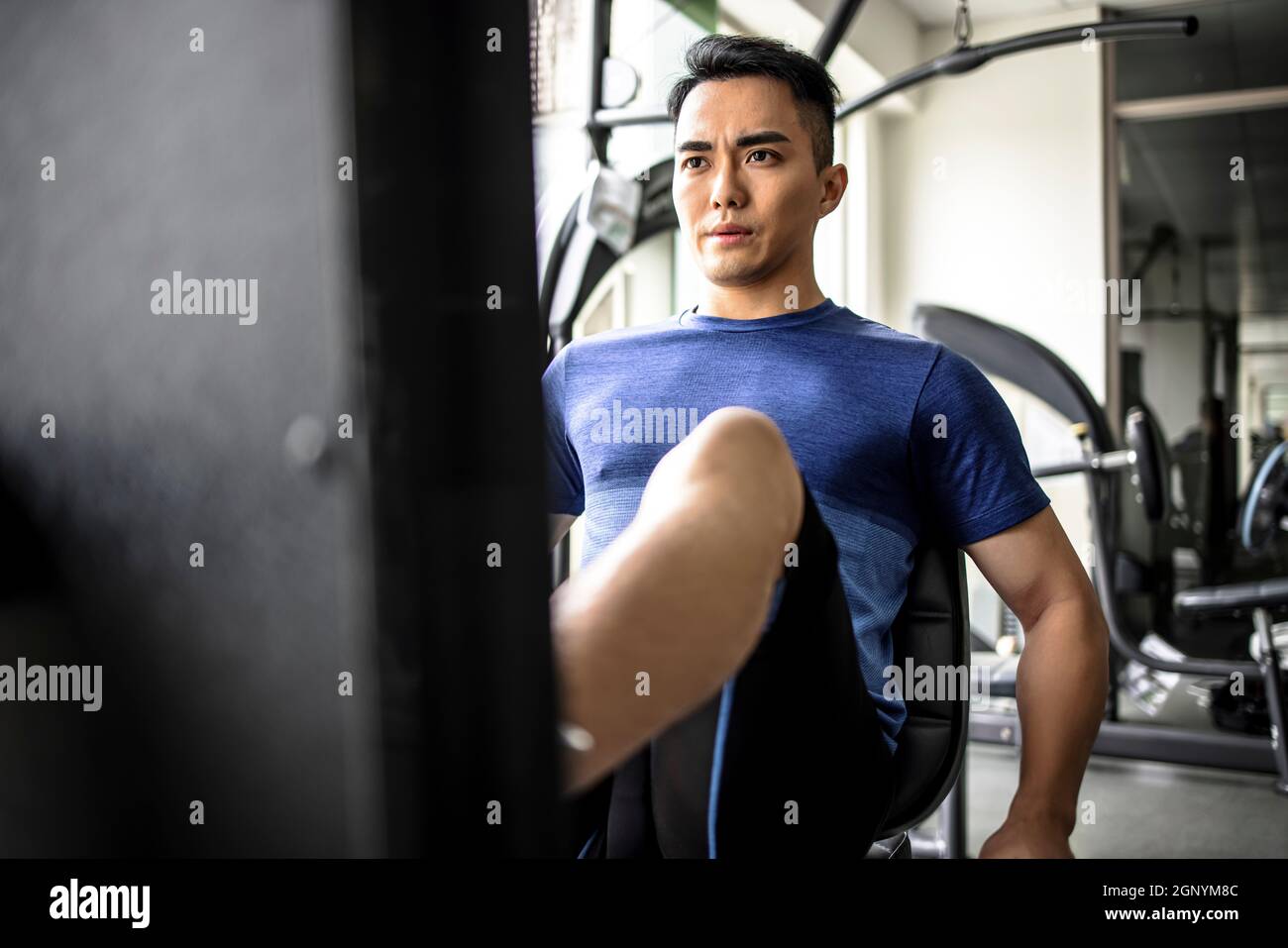 Young male leg press workout hi-res stock photography and images - Alamy