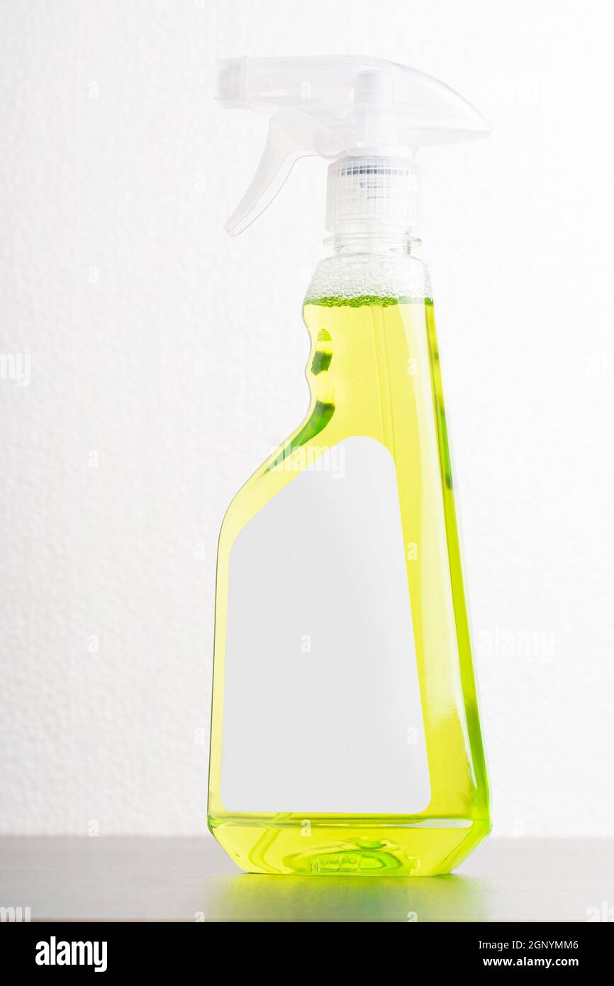 Cleaning liquid bottle in front of light gray background, editable mock ...