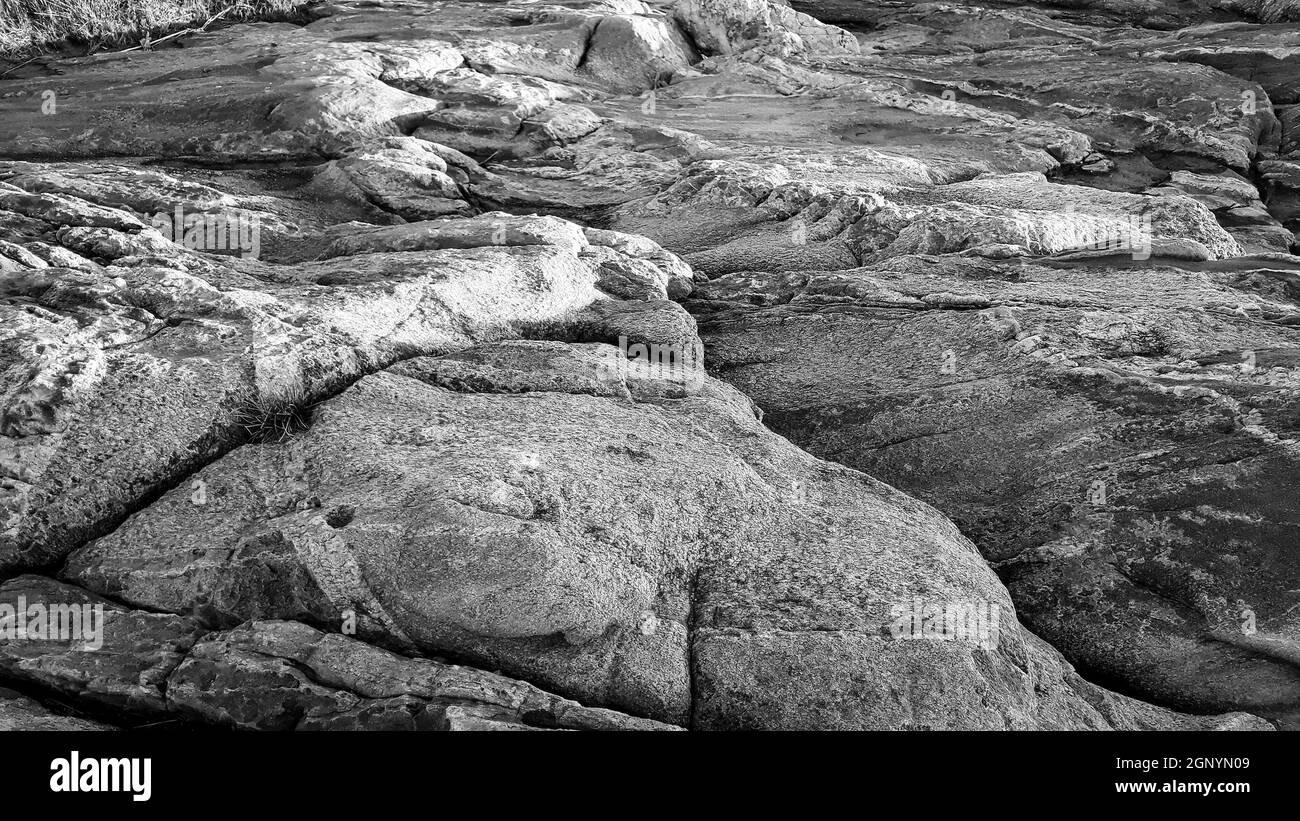 Close up shot big rocks at beach coast background Stock Photo - Alamy
