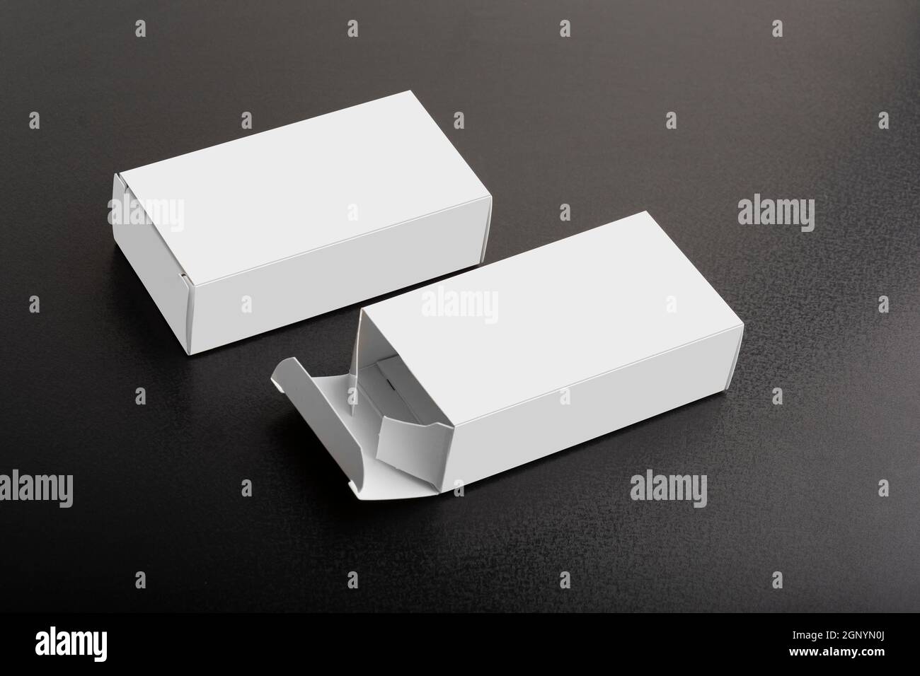 Two small packages on dark background, editable mock-up series template ...